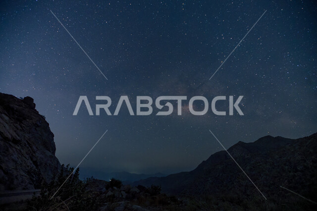 Mountain peaks and heights in the Taif region in Saudi Arabia at night ...
