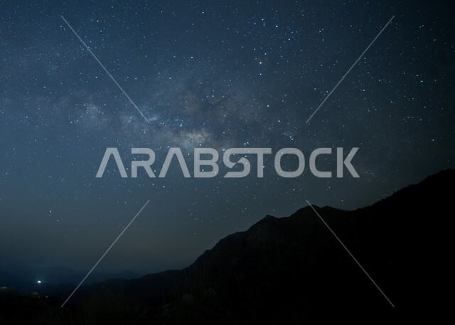 Mountain peaks and heights in the Taif region in Saudi Arabia at night ...