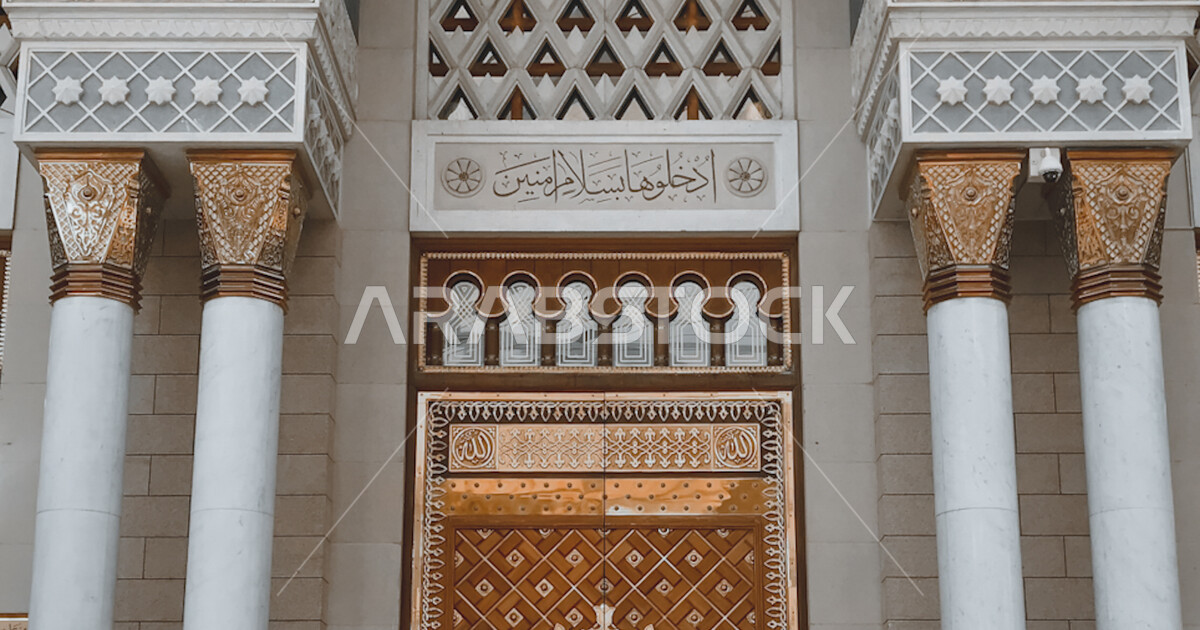 Entry gate to the Prophet’s Mosque, performing prayers in the Prophet’s ...