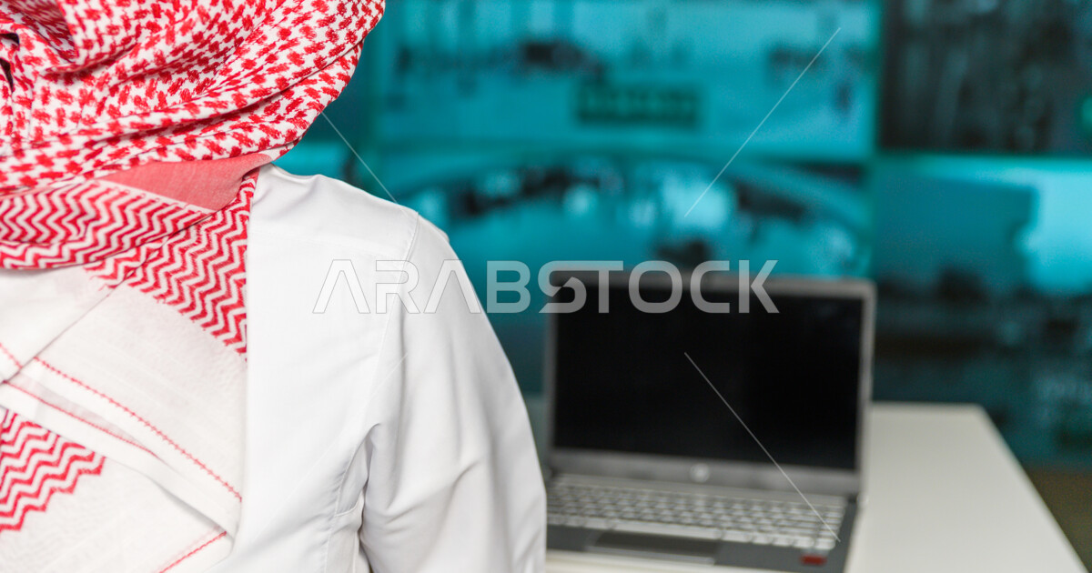 A Saudi Gulf man runs the security section, tracks surveillance cameras ...