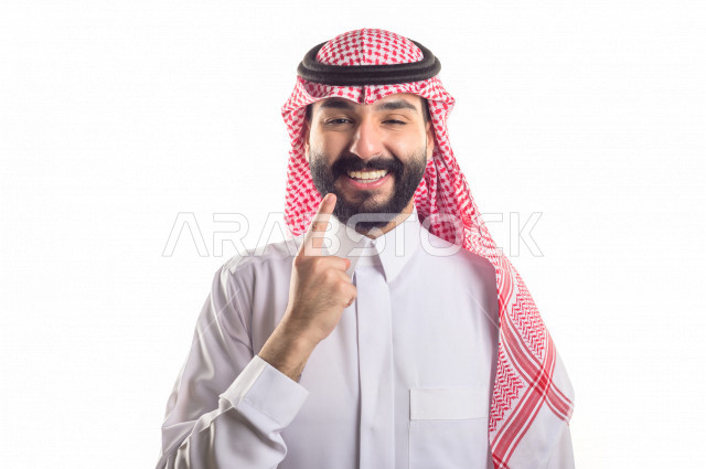 Portrait of a happy Saudi Gulf man, a Hollywood smile, using porcelain ...