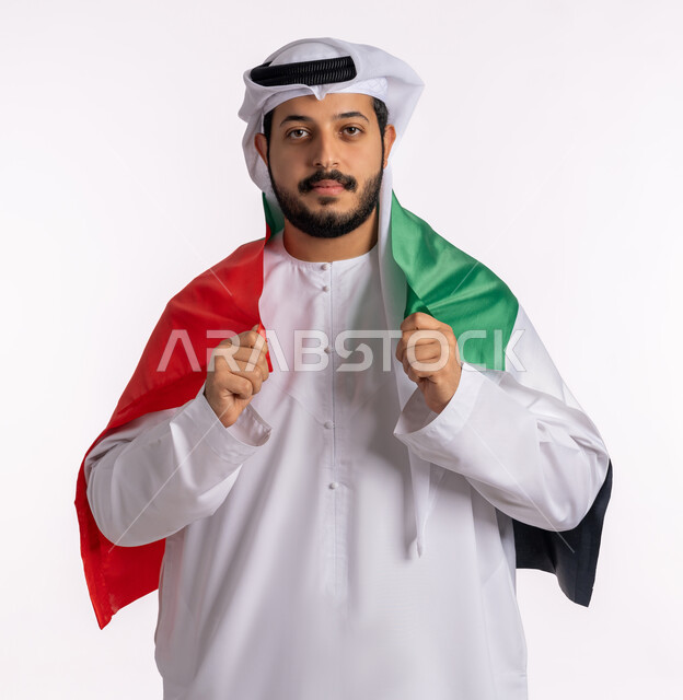 UAE Independence Day, a portrait of an Emirati Gulf Arab man wearing a ...