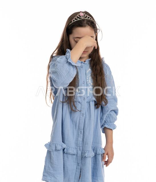 Feeling of laziness, lethargy and exhaustion, a Saudi girl wearing a ...