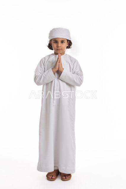 A Saudi boy asking for permission and asking for something, a hand ...