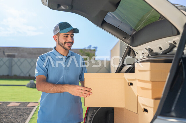 Online sales representative, a young Arab Emirati Gulf man wearing ...