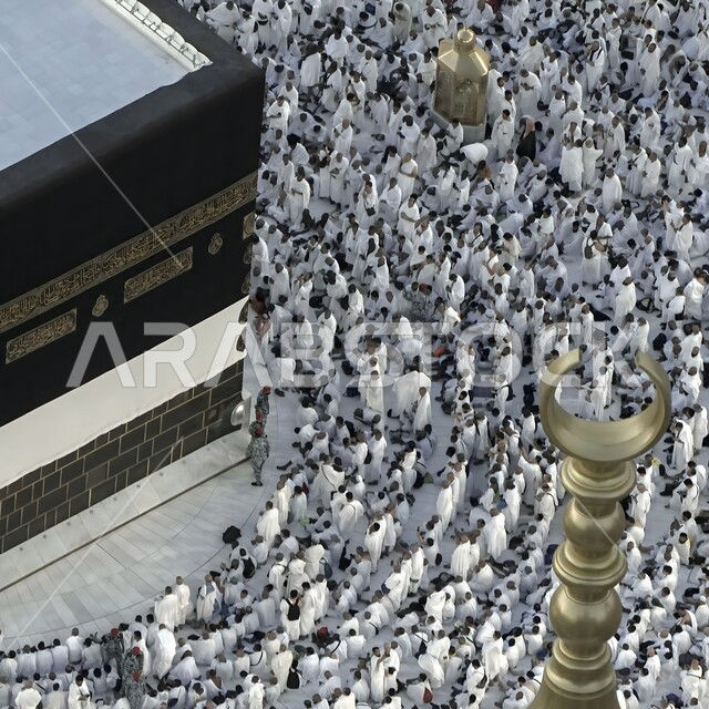 Ihram of the Holy Kaaba and the circumambulation of pilgrims around it ...