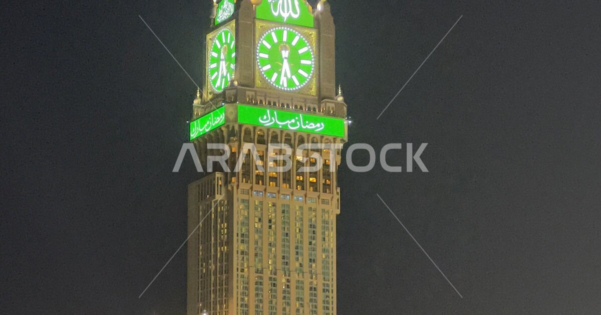 Illumination of the Royal Clock Tower at night in the sky of Mecca ...