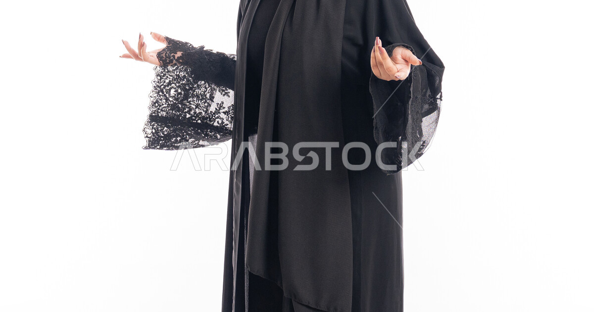 Surprise and astonishment at something, a young Saudi woman looks at ...