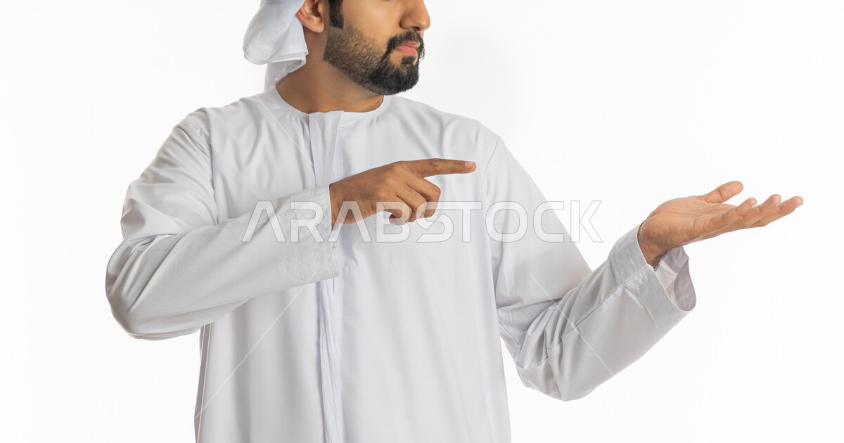 Gestures of carrying and lifting something, portrait of an Emirati Gulf ...