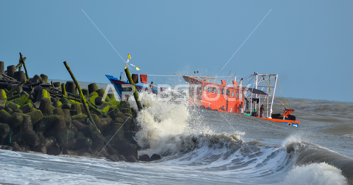Strong sea waves crash into a fishing boat, high sea waves, fishing ...