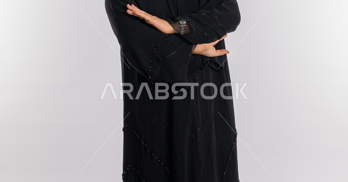 Expressions of hysterical laughter, portrait of a veiled Saudi Arab ...