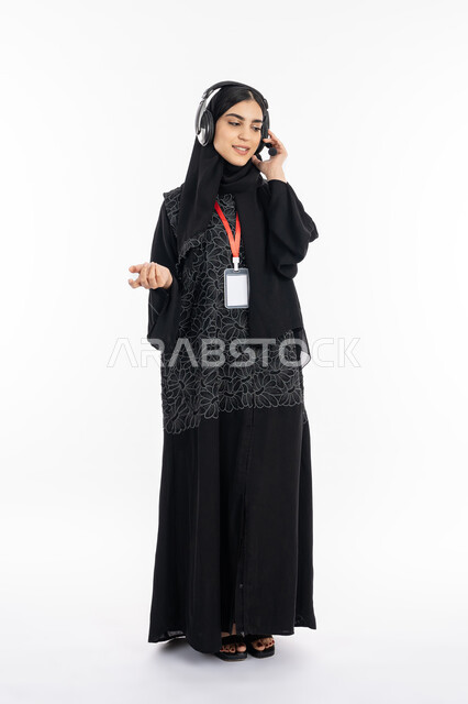 Working in the technical support department, using headphone technology ...