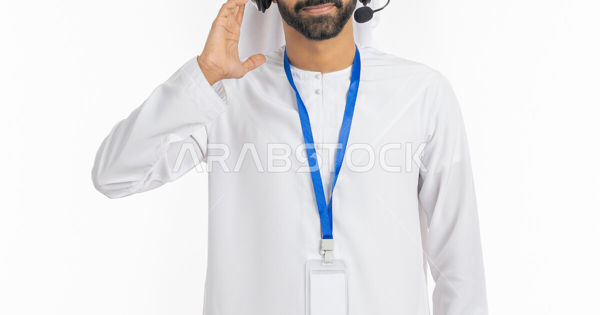 Using headphone technology, wearing a personal badge with a blue ribbon ...