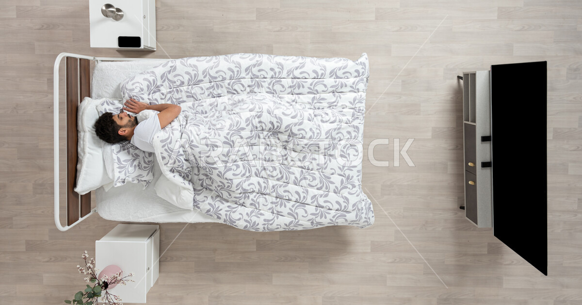 Following a healthy lifestyle, the benefits of early sleep, an overhead portrait of a young ...