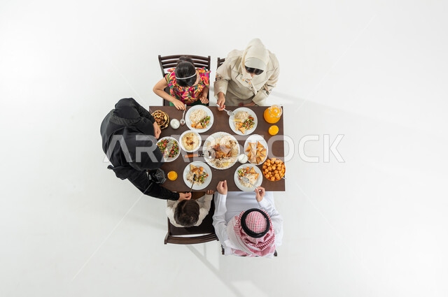 Presenting Saudi cuisine, a vertical overhead portrait of a Saudi Gulf ...