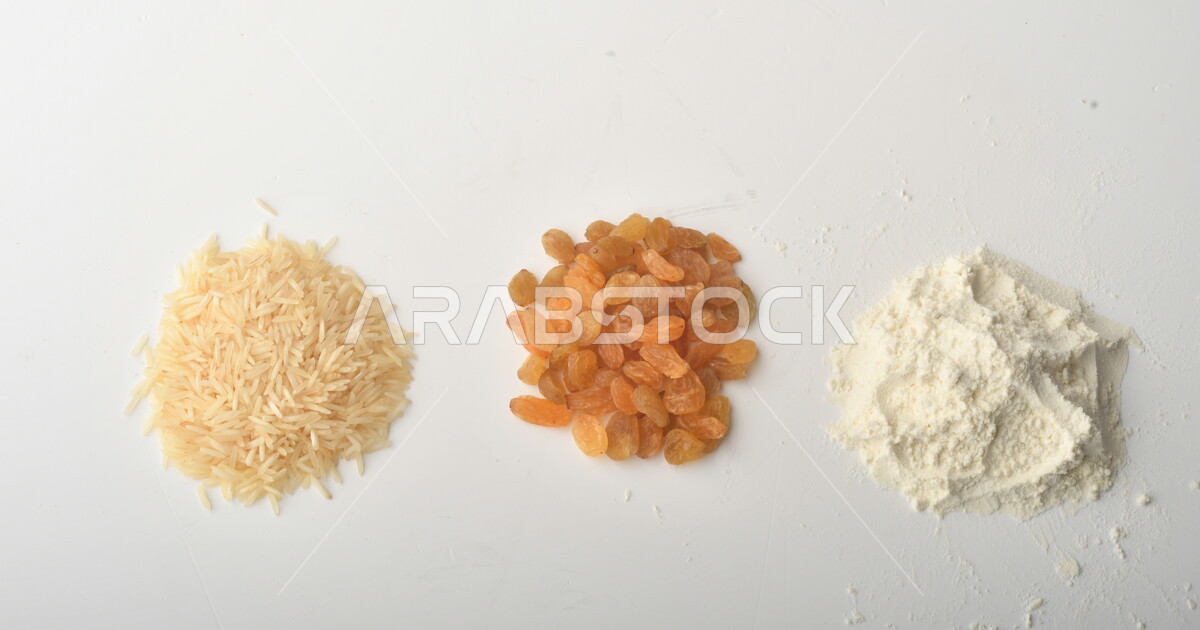 A group of rice, raisins , flour on a white background. - Photo #16407 ...