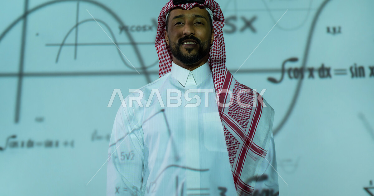 Numbers and calculations in mathematics, a Saudi Gulf Arab man wearing ...