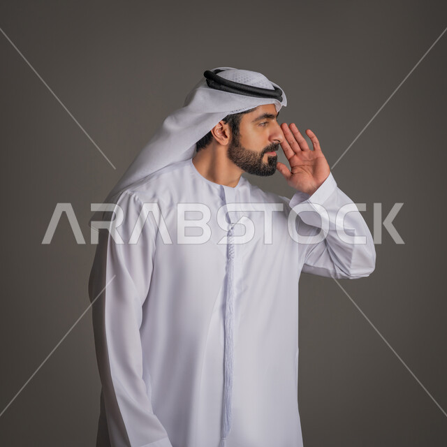 Expression in body language and gestures, portrait of a young Arab Gulf ...
