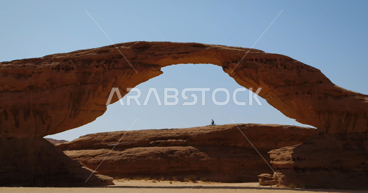 The famous Arch Rock in the desert areas of the Kingdom of Saudi Arabia ...