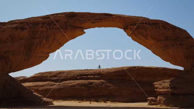 The famous Arch Rock in the desert areas of the Kingdom of Saudi Arabia ...