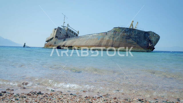 The wreck of the sunken Georgios G ship on the shore of the Red Sea in ...