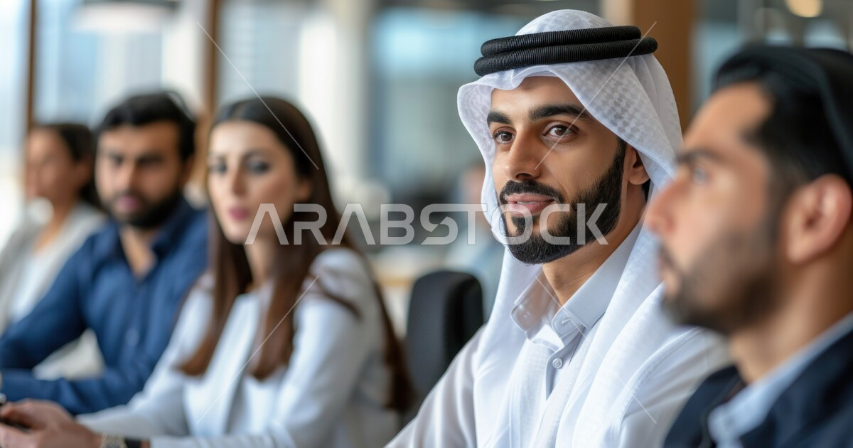 Agreement on commercial projects, a close-up photo of a Saudi Gulf Arab ...