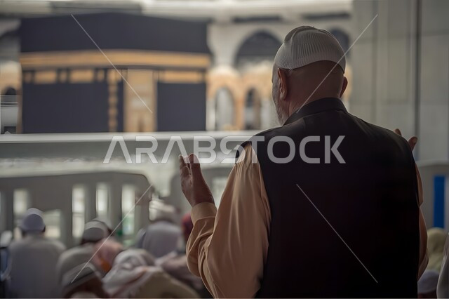 Supplicating to God through acts of obedience, an Arab man wearing ...