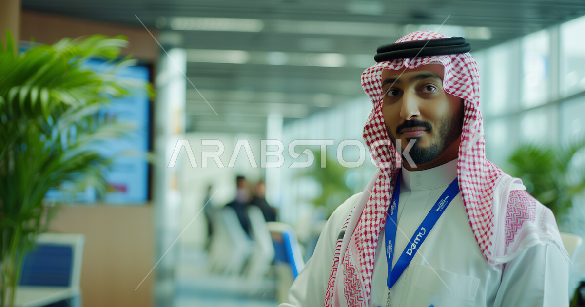 Office work in the Kingdom of Saudi Arabia, a Saudi Gulf Arab man ...