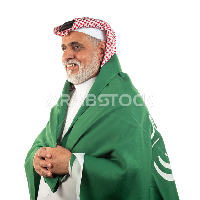 Portrait of an old Saudi Arab man putting the flag of Saudi Arabia on ...