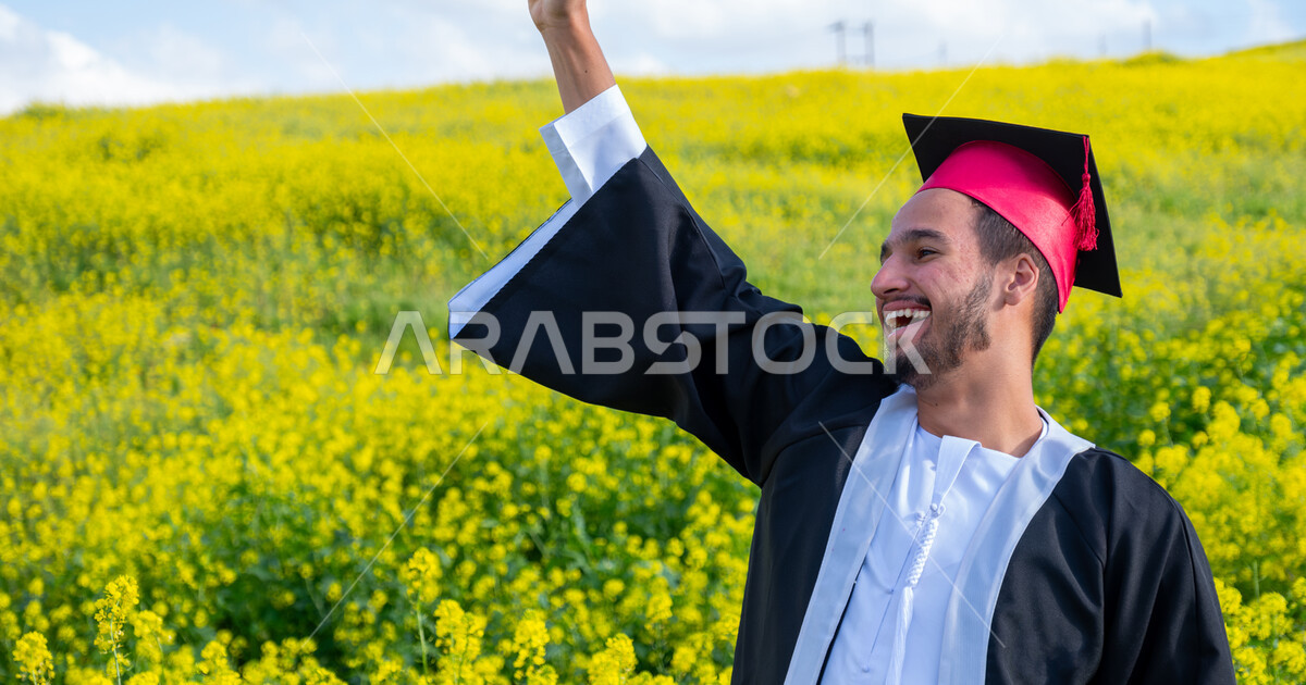 Celebrating graduation day with gestures of happiness and enthusiasm ...