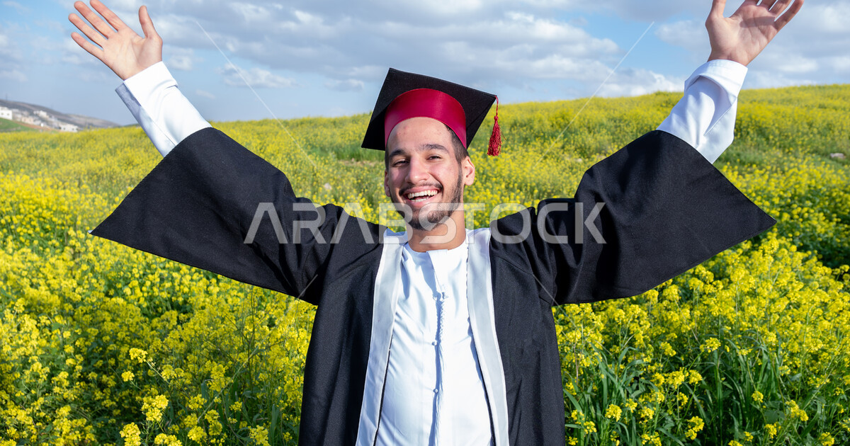 Celebrating graduation day with gestures of happiness and enthusiasm ...