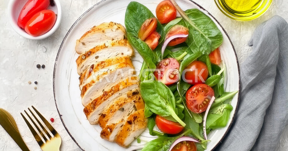 A plate of fillet pieces with vegetables, a picture from above of ...