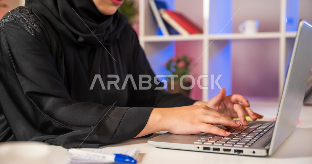 A close-up picture of a Saudi-Gulf business woman working at the ...