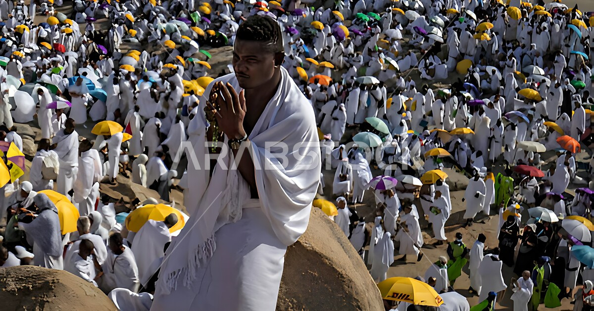 Standing at Mount Arafat and performing the Hajj rituals, pilgrims in the Sacred House of God ...