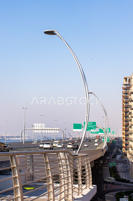 Cars and vehicles on the Infinity Bridge in Deira, Dubai, United Arab ...