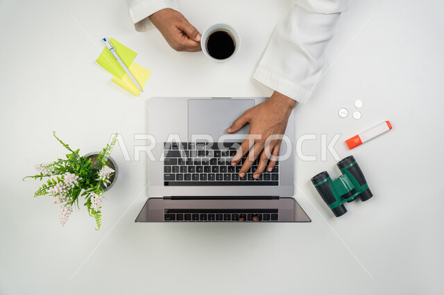 Doing office work, using modern technical devices, a comfortable office ...