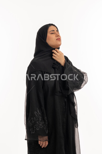 Influenza and pneumonia, side portrait of a veiled Gulf Arab Emirati ...
