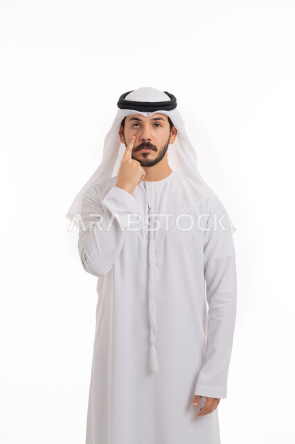 High eye pressure, portrait of a sick Arab Gulf Emirati man wearing a ...