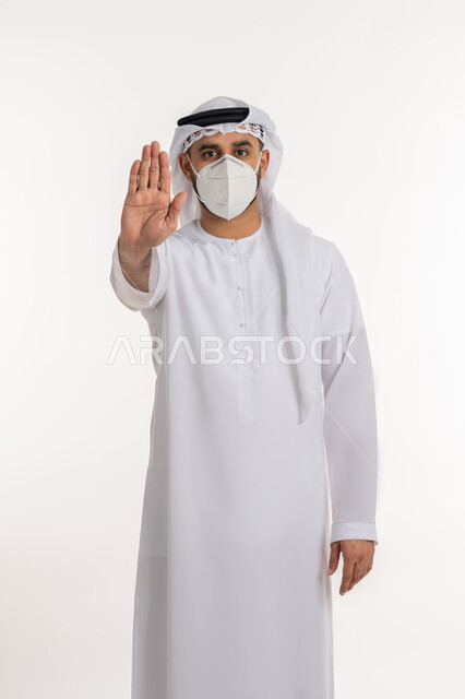 Avoiding the spread of infection with Covid 19, a portrait of an Arab ...