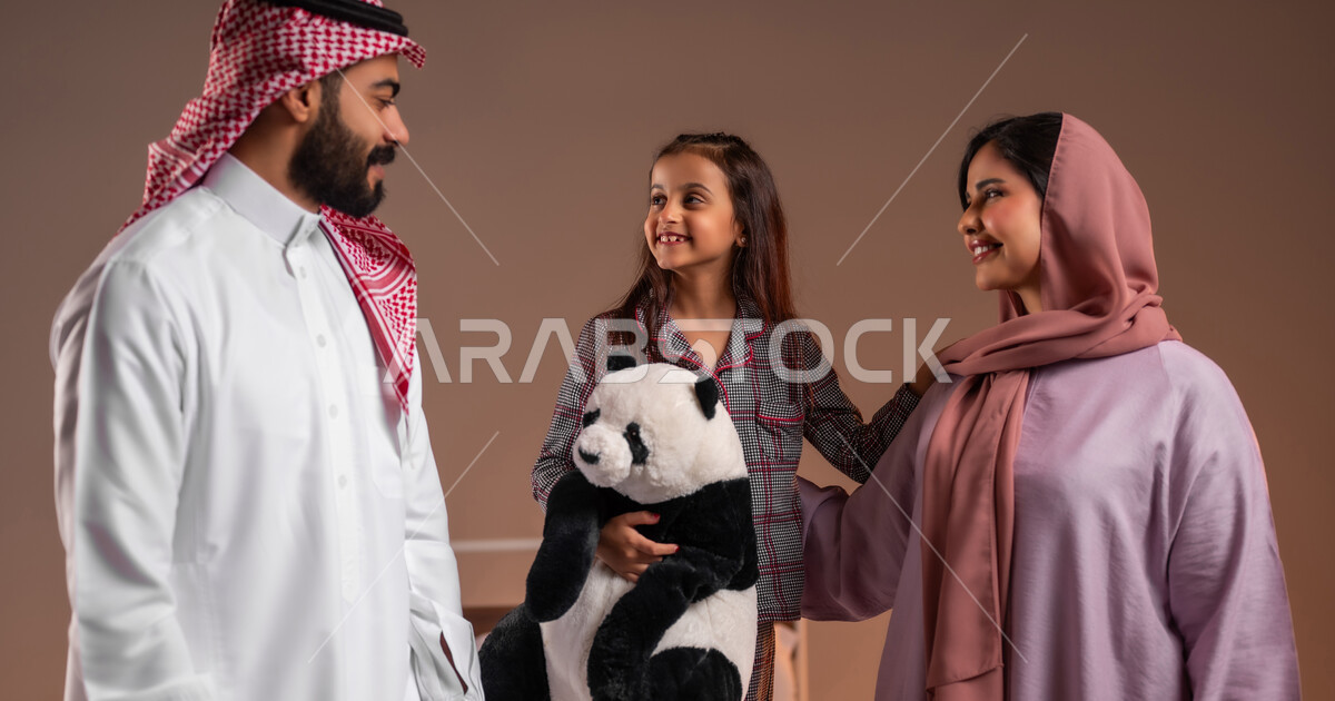 Preparing and getting ready for bed, portrait of a Saudi Arabian Gulf ...