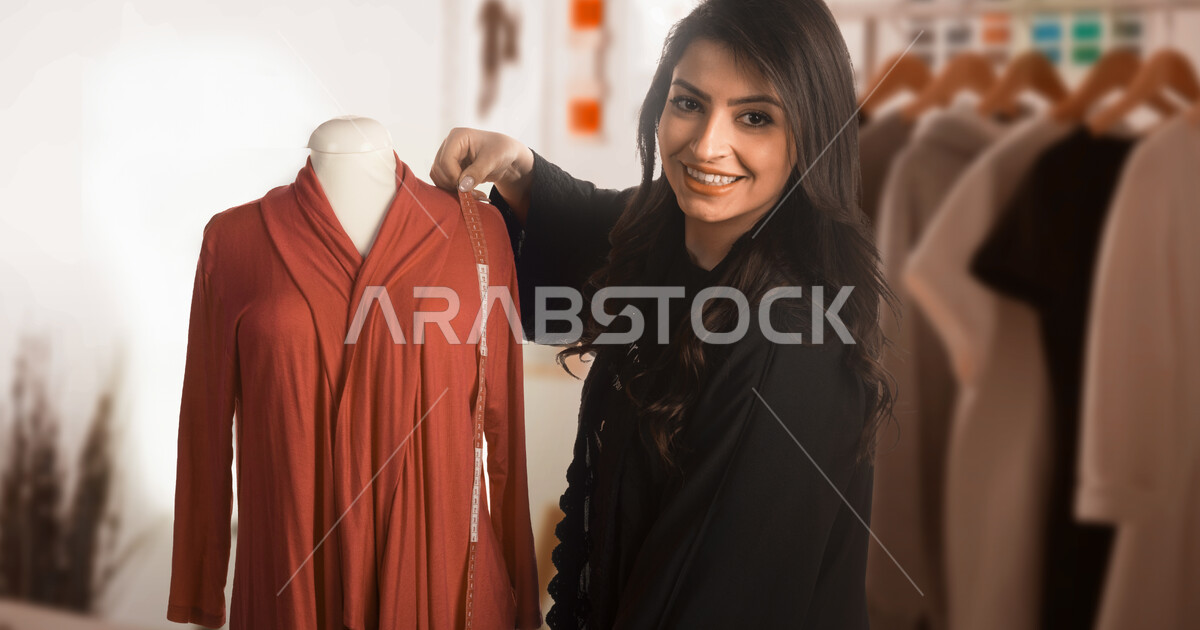 A close-up photo of a Saudi Arabian Gulf businesswoman, working in ...