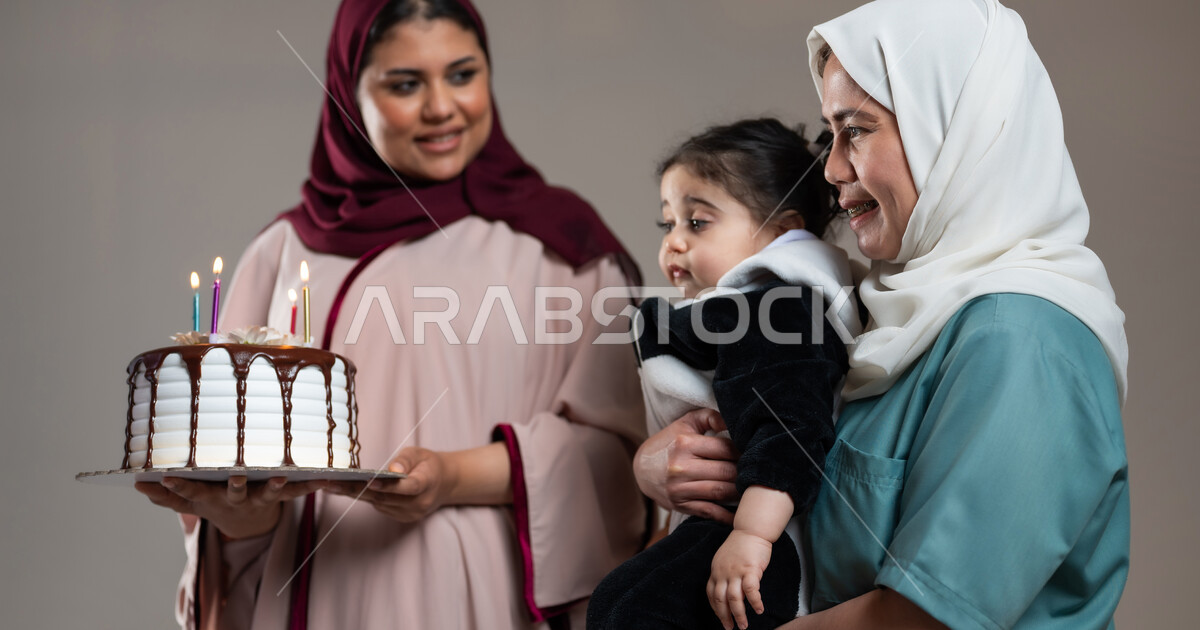 A joyful atmosphere for a Saudi family, celebrating birthdays, a ...