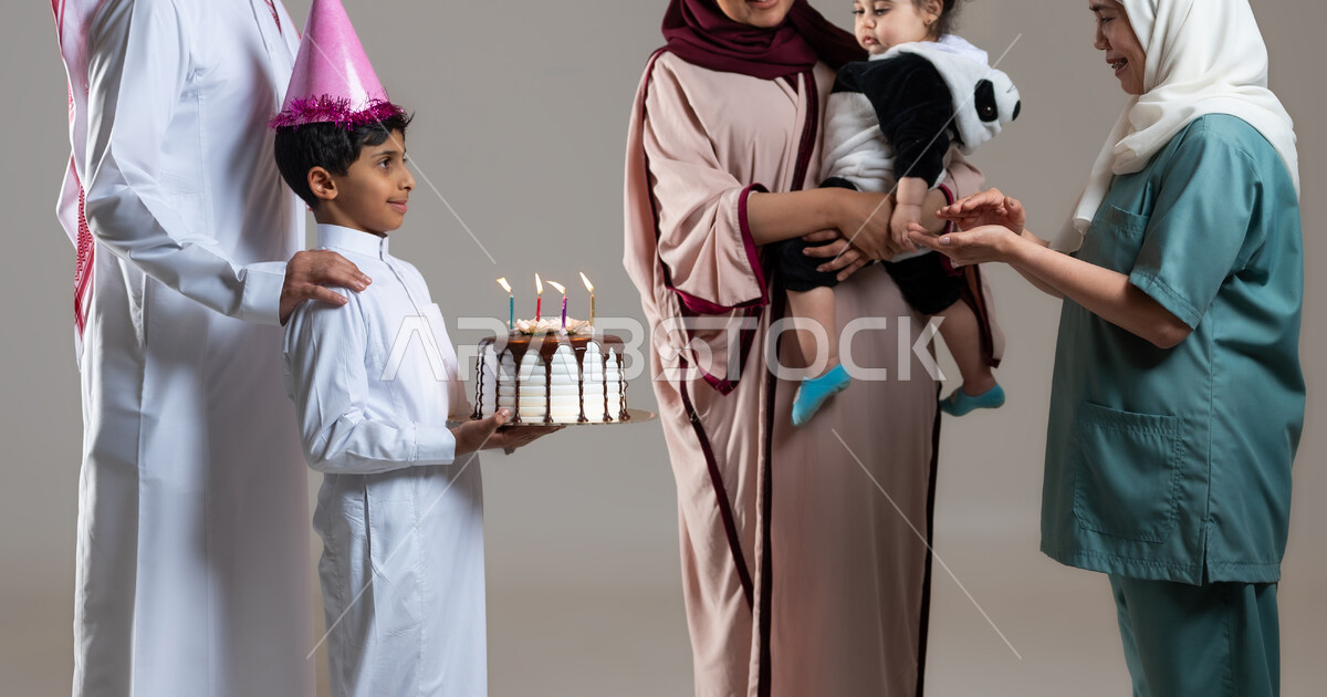 A joyful atmosphere for a Saudi family, celebrating birthdays, a ...