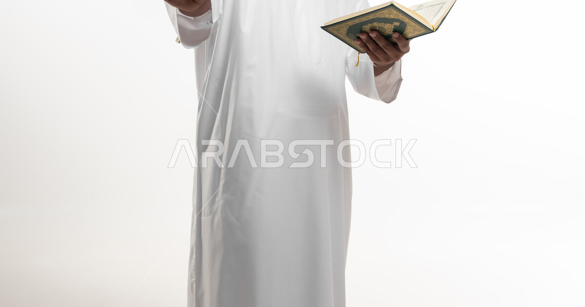 Looking at the camera with gestures of reverence and reassurance ...