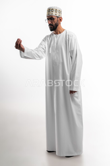 A hand movement means lowering the volume and calming down, facial and ...