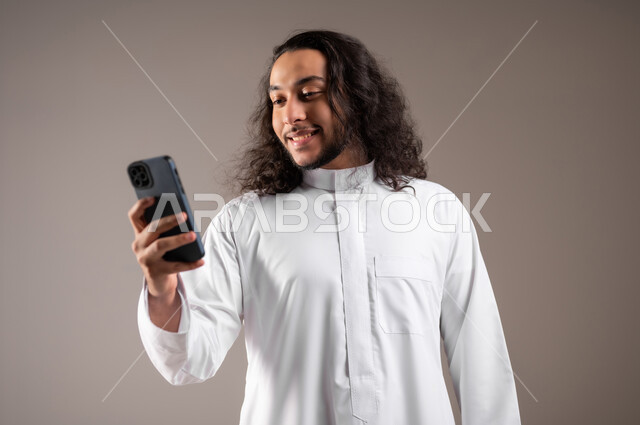 Using modern technical devices, browsing social media via mobile phone ...