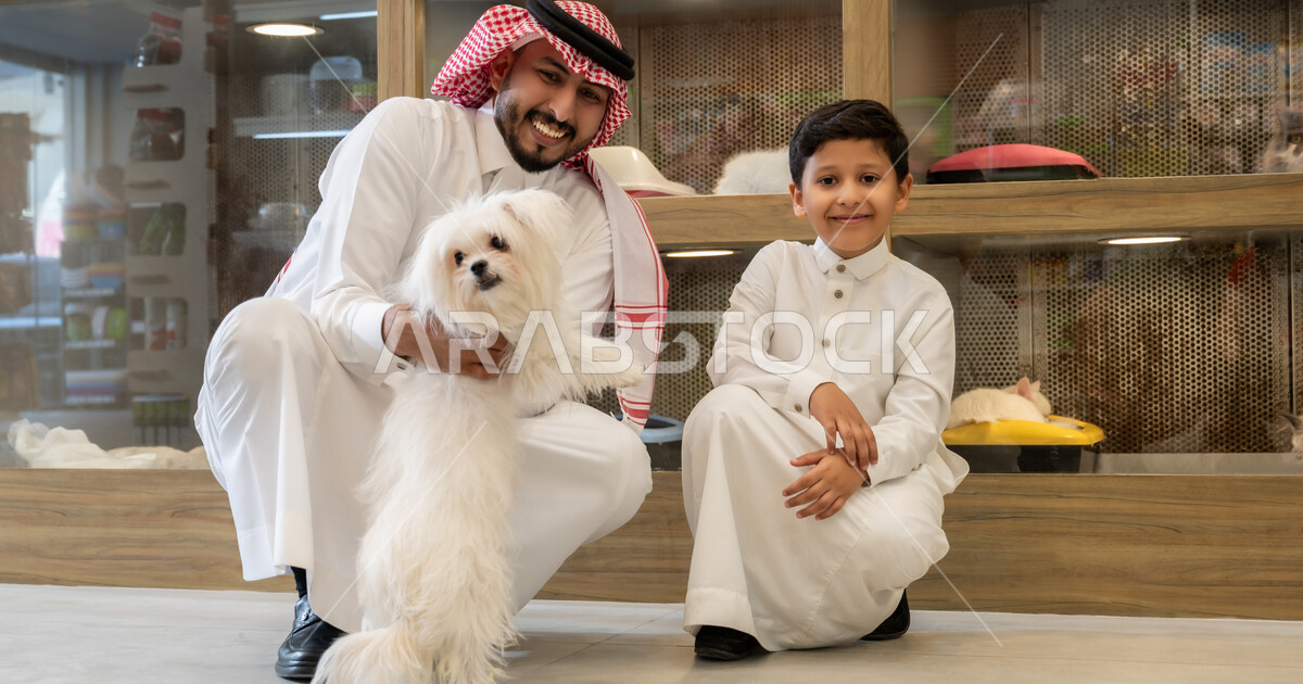 The concept of friendly, loyal animal welfare, a smiling Saudi Arabian ...