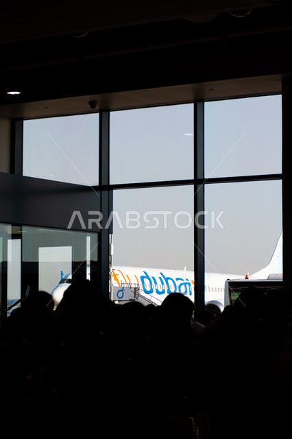 The most important air hub in the Middle East, passengers sitting in ...