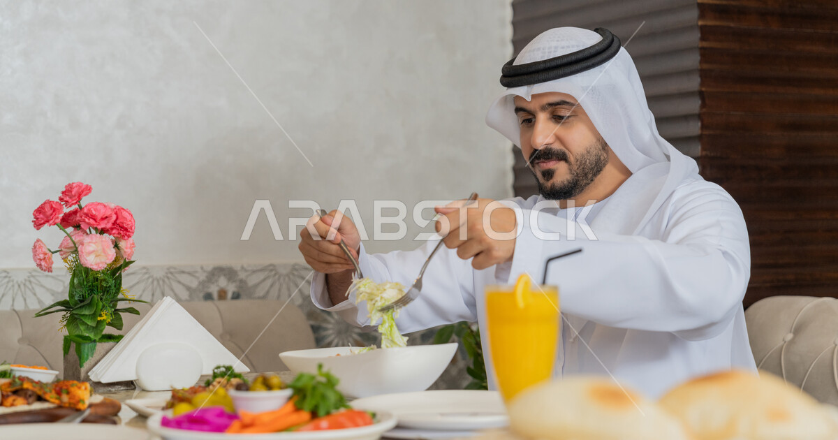 A diverse and different selection of food and drinks, enjoying ...