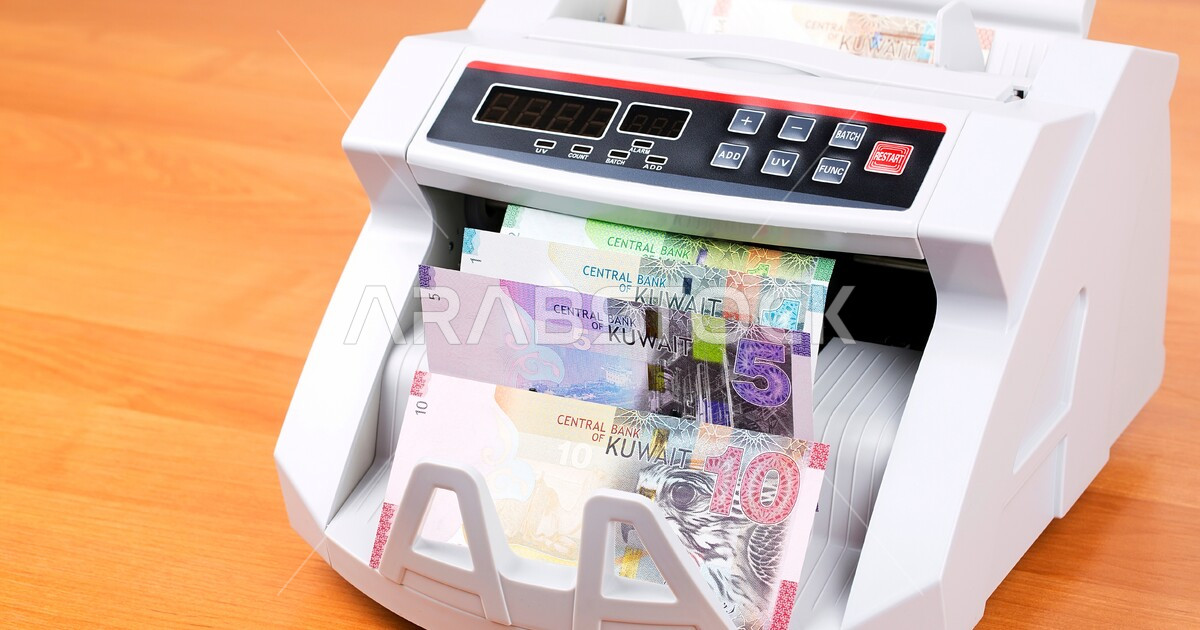 The official dinar Kuwaiti currency circulated in the markets of Kuwait ...